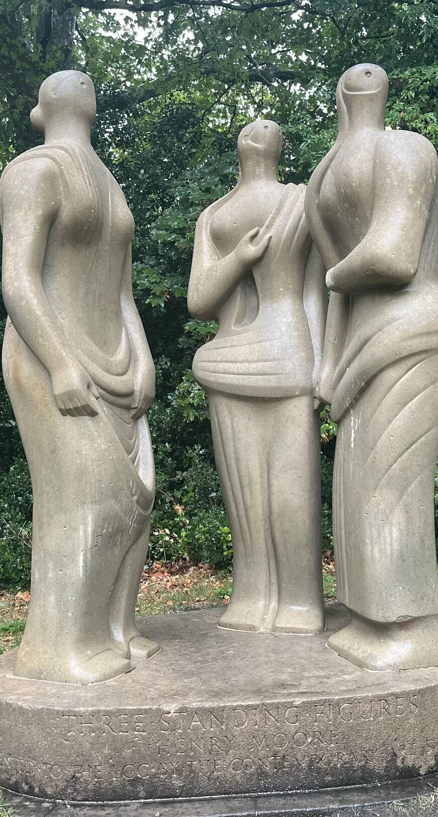 three standing figures